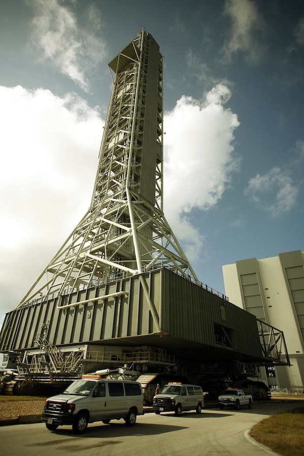 Spaceflight Now | Breaking News | Photos: Mobile launch tower heads for pad